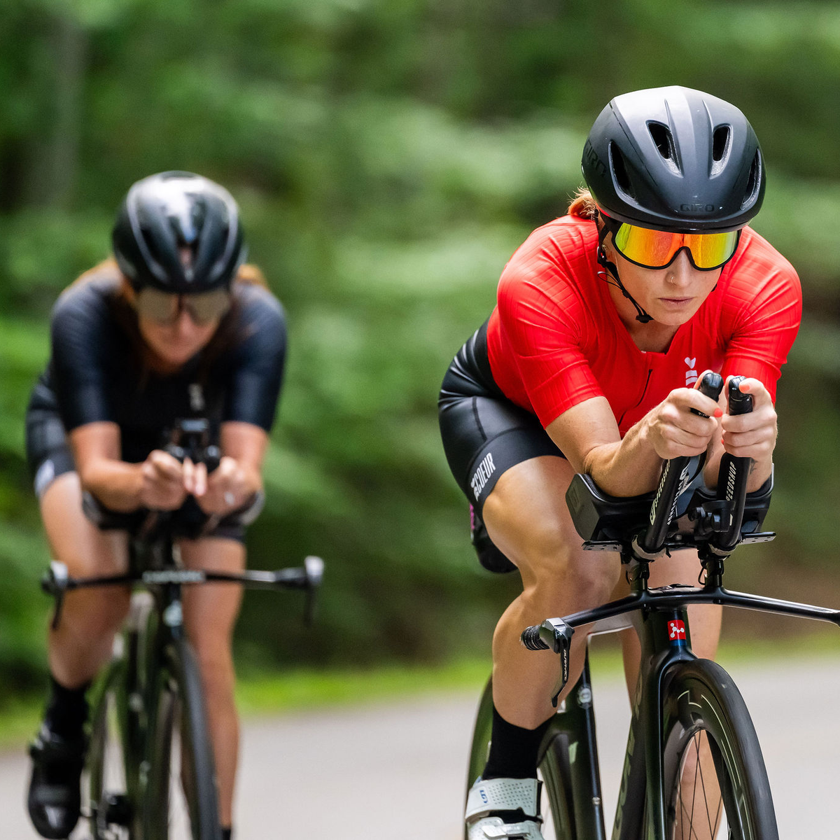 Shop Solid Tri Suits - Women's Sleeved One Piece Triathlon Suit – Coeur Sports